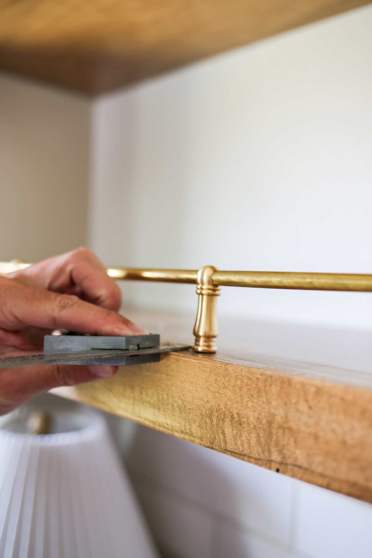 How I Made a Brass Gallery Rail from Lamp Parts - The Simple Cozy Haven