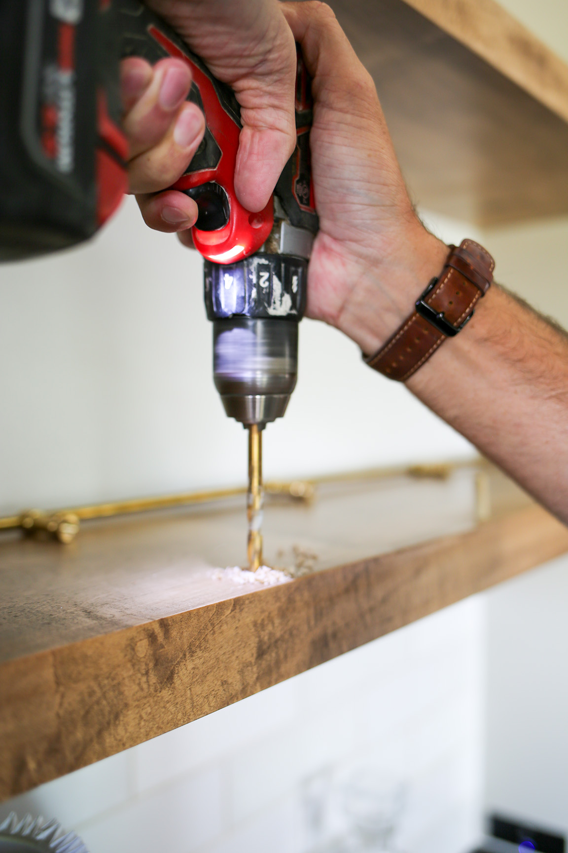 How I Made a Brass Gallery Rail from Lamp Parts - The Simple Cozy Haven